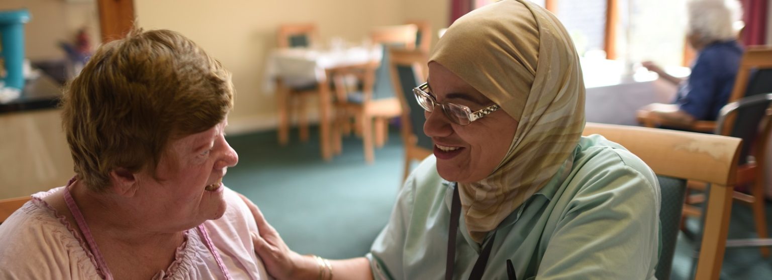 Care home muslim staff with resident | CHS Group